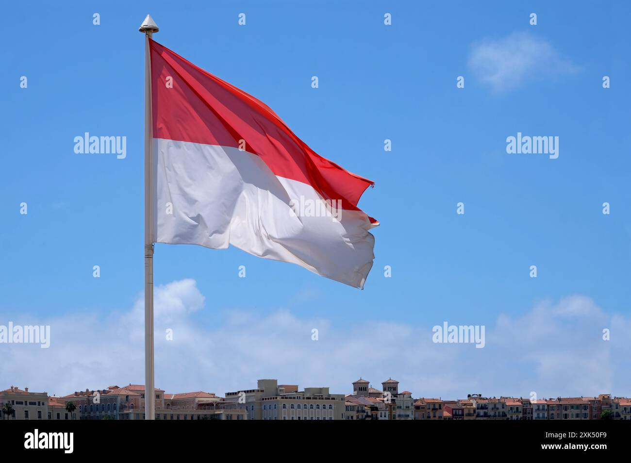 Monaco flag waving on wind hi-res stock photography and images - Alamy