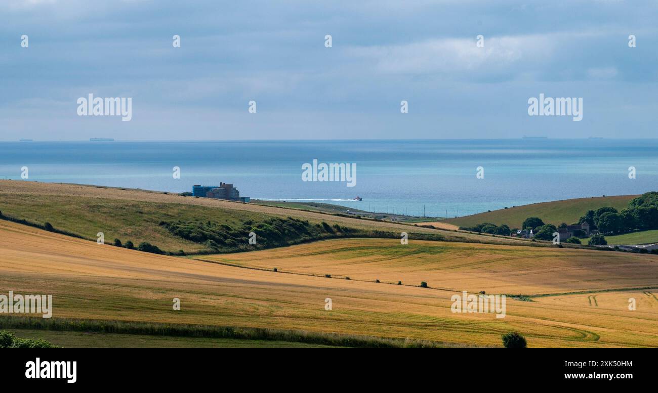 Brighton UK 21st 2024 - A boat passes by the Blind Veterans UK building ...