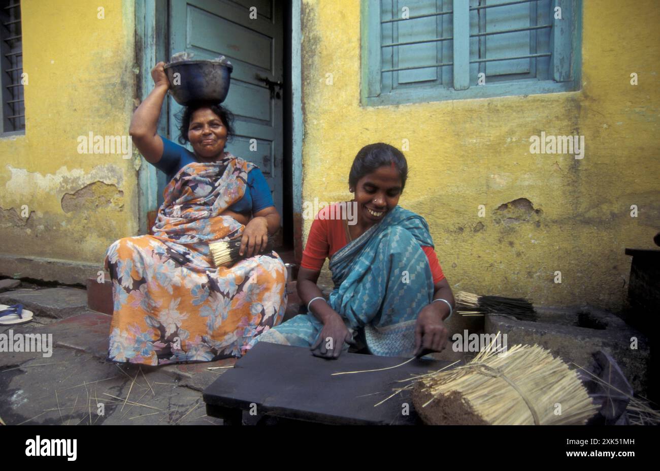 Young Women and Girls of a Family Factory of Incense sticks at work in ...