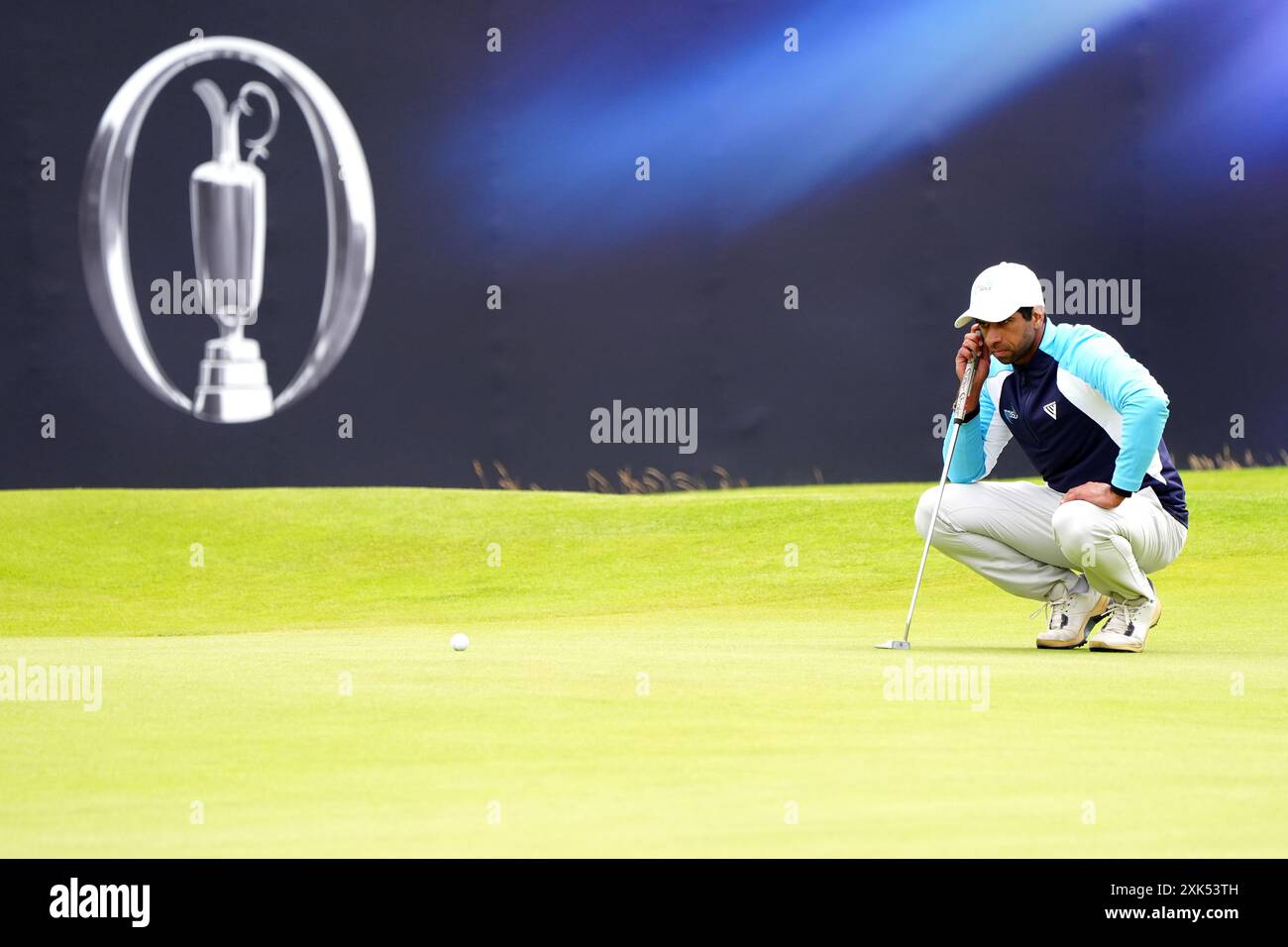 England's Aaron Rai on the 18th green during day four of The Open at ...