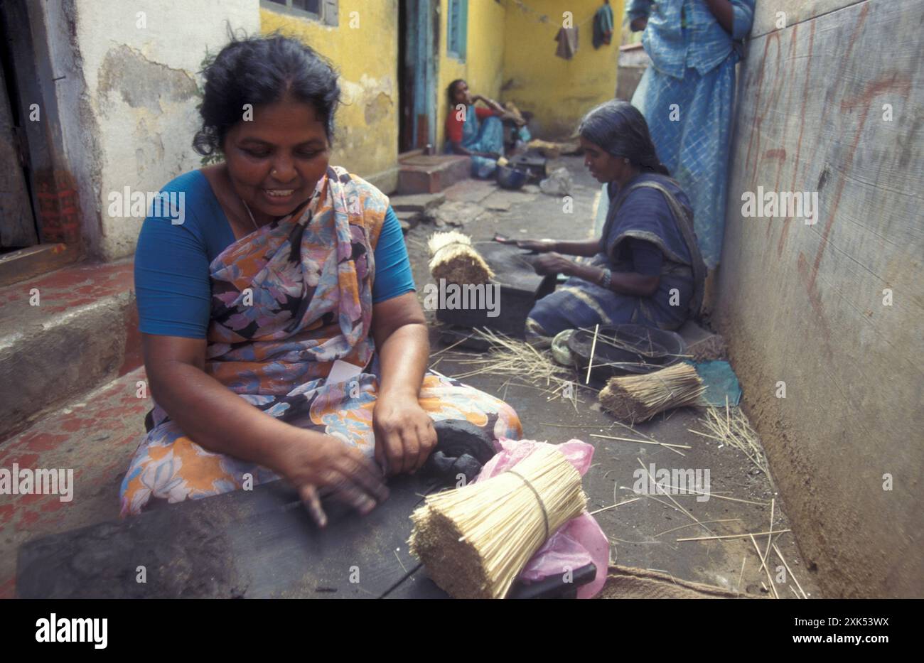 Young Women and Girls of a Family Factory of Incense sticks at work in ...
