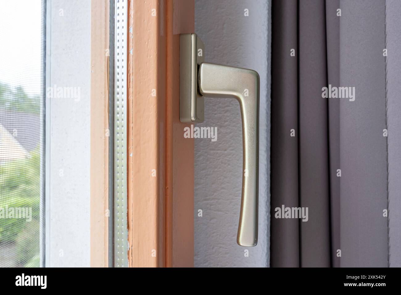 window handle on a closed window Stock Photo - Alamy