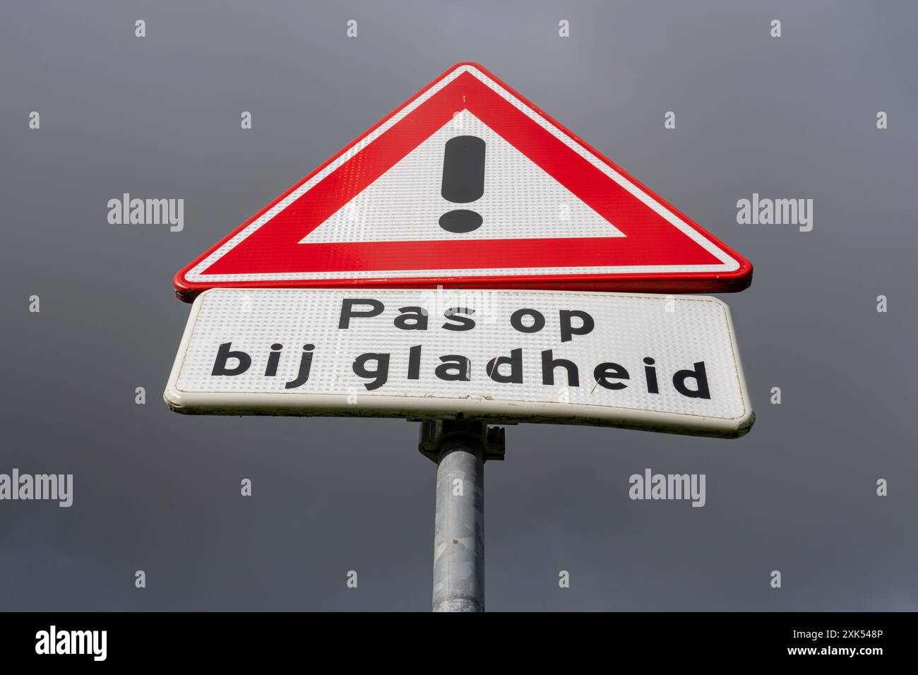Dutch road sign: danger, be careful on slippery surfaces Stock Photo ...