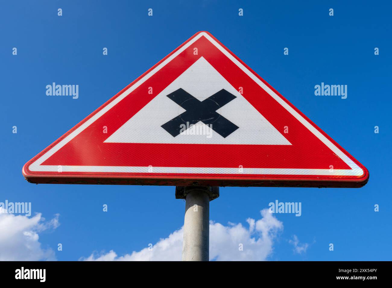 Dutch road sign: dangerous crossing Stock Photo - Alamy