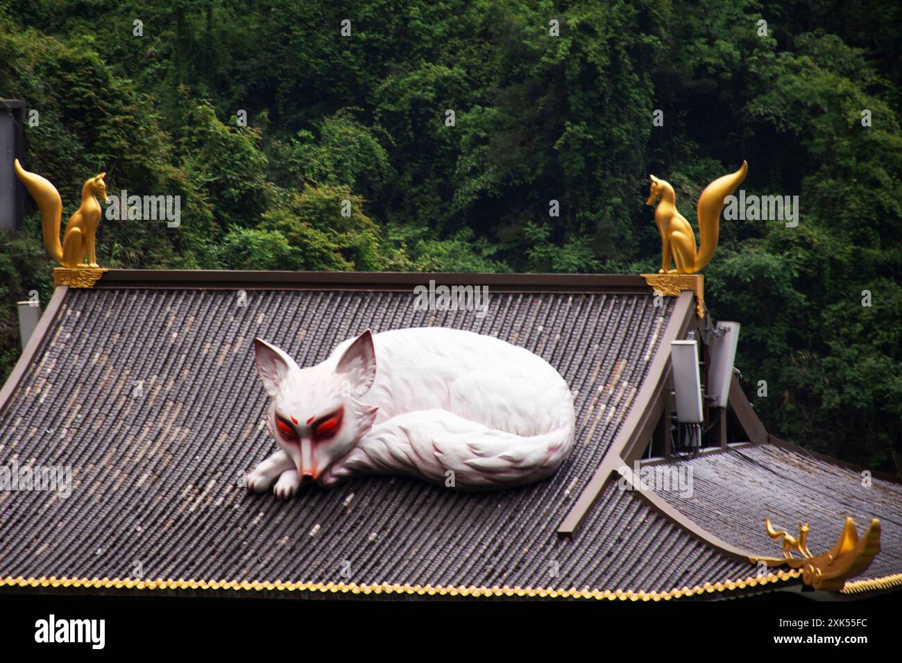 White fox statue on antique building architecture of stage theater ...