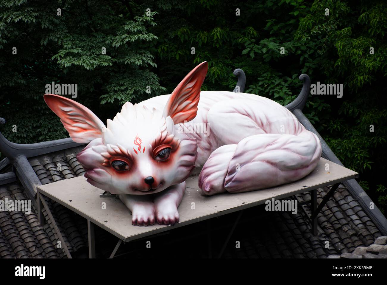 White fox statue on antique building architecture of stage theater ...
