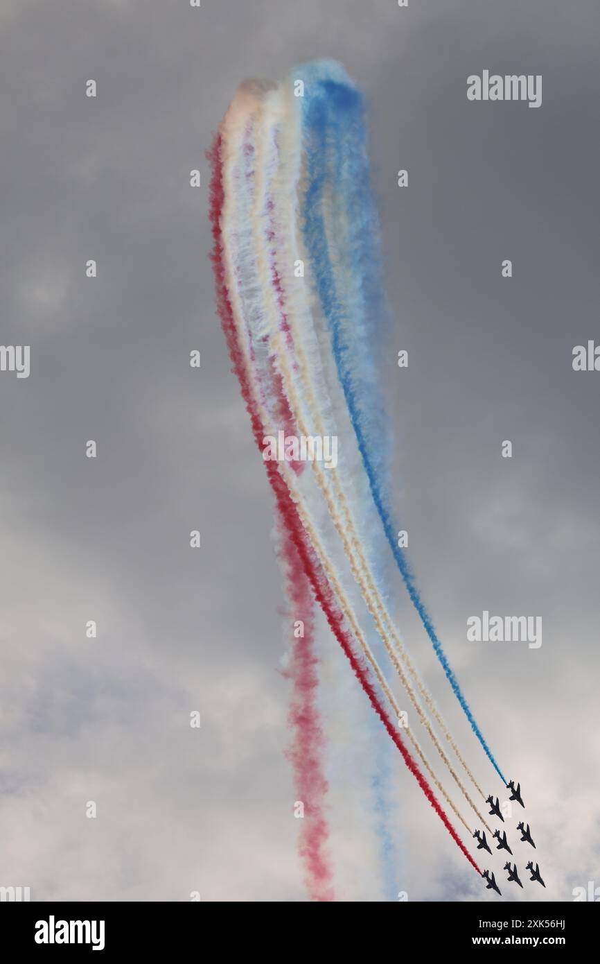 The Patrouille de France during an air show to demonstrate the strength ...