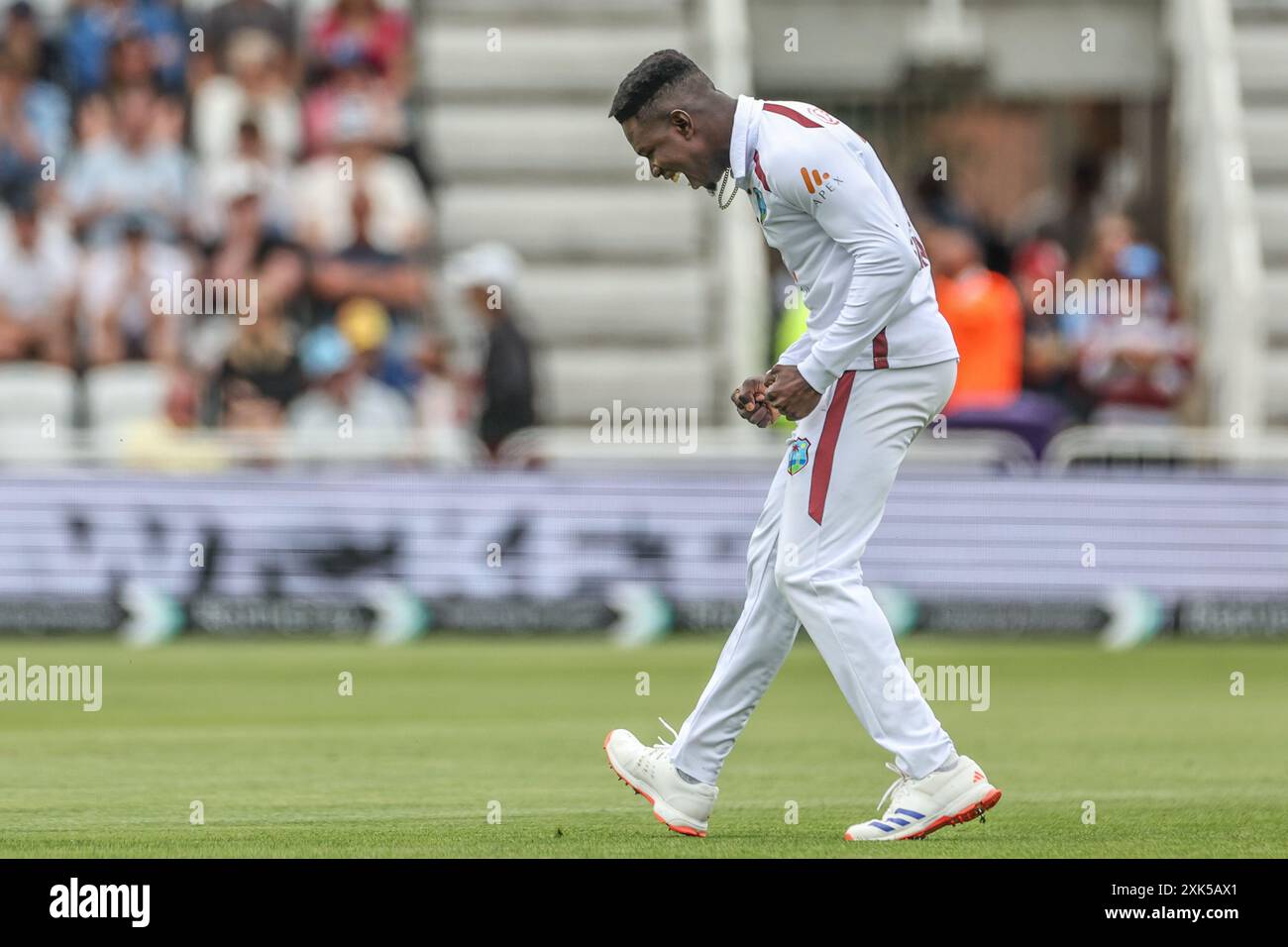 Kevin Sinclair of West Indies celebrates the wicket of Jamie Smith of ...