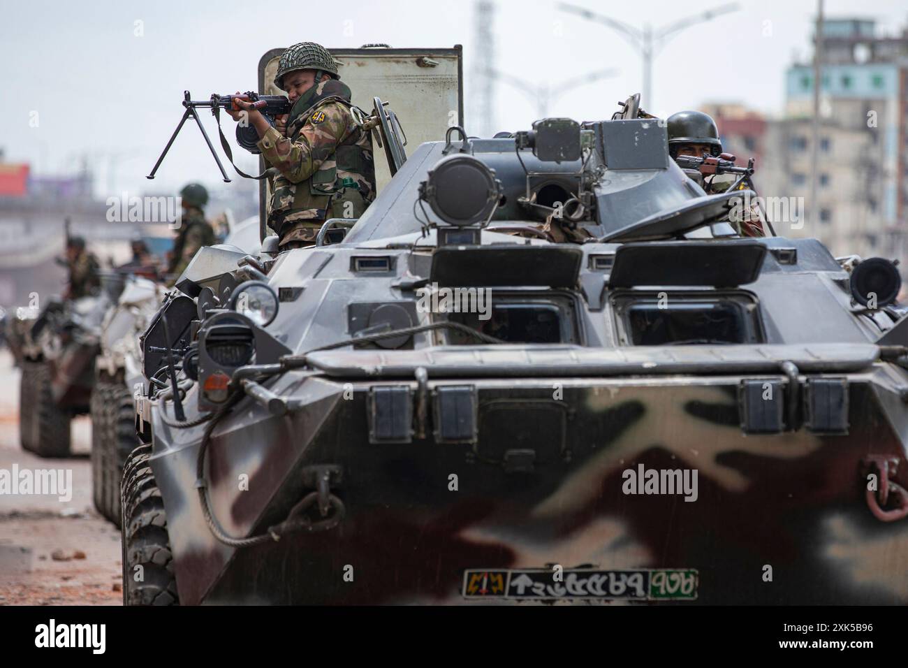 Bangladeshi military force soldiers on armored vehicles patrol the ...