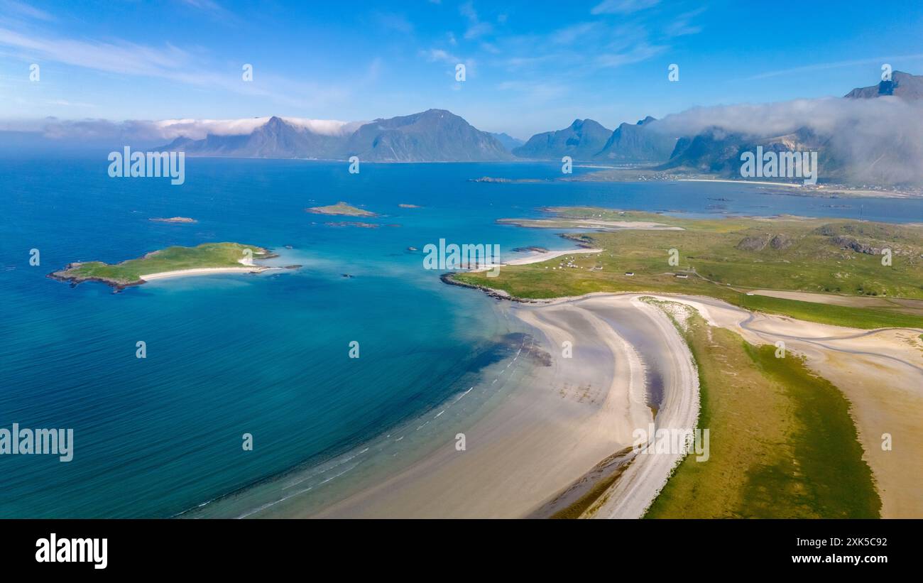 An aerial view of a stunning coastal landscape in Norway, featuring a ...