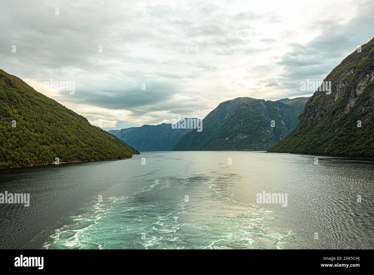 Sailing through the deep fjords of Norway Stock Photo - Alamy
