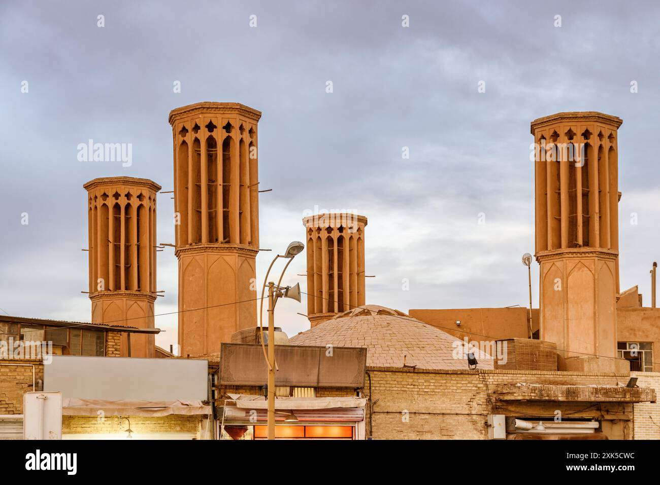 Traditional Iranian windcatcher towers (badgir) in the historical city of Yazd, Iran. Unique ...