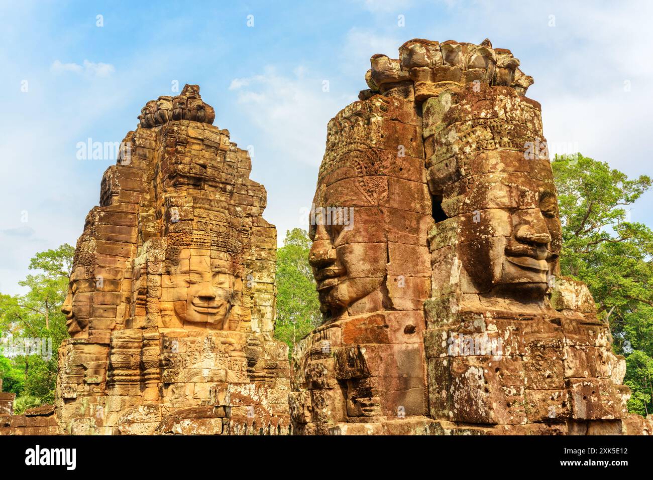 Gorgeous view of towers with stone faces of Bayon temple Stock Photo ...