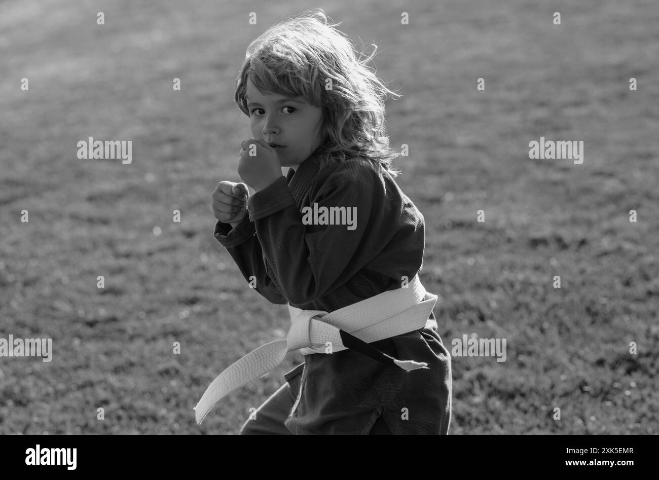 Kid boy practicing karate outdoor. Sport karate kids. Little boy ...