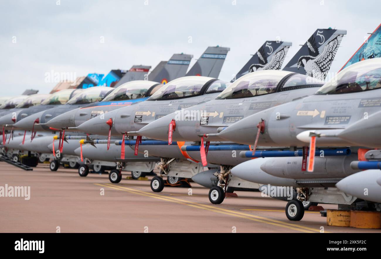 F-16 jets are lined up on display at the Royal International Air Tattoo ...