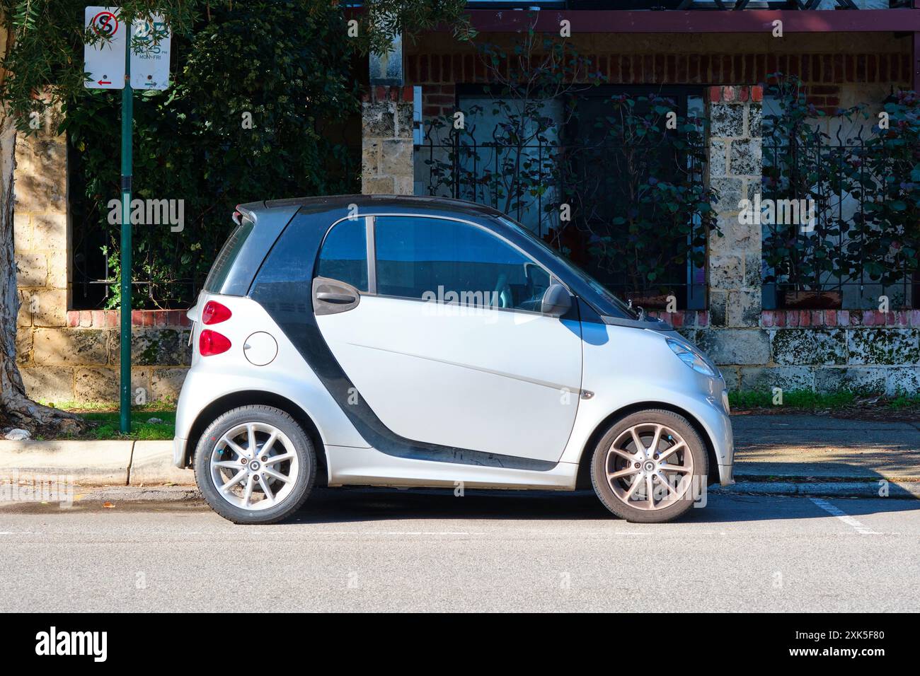 A silver and black Smart Fortwo two-seater micro car parked on the street in Perth, Western ...