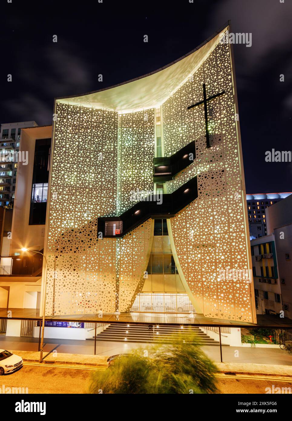 Night view of amazing modern building of Singapore Life Church Stock ...