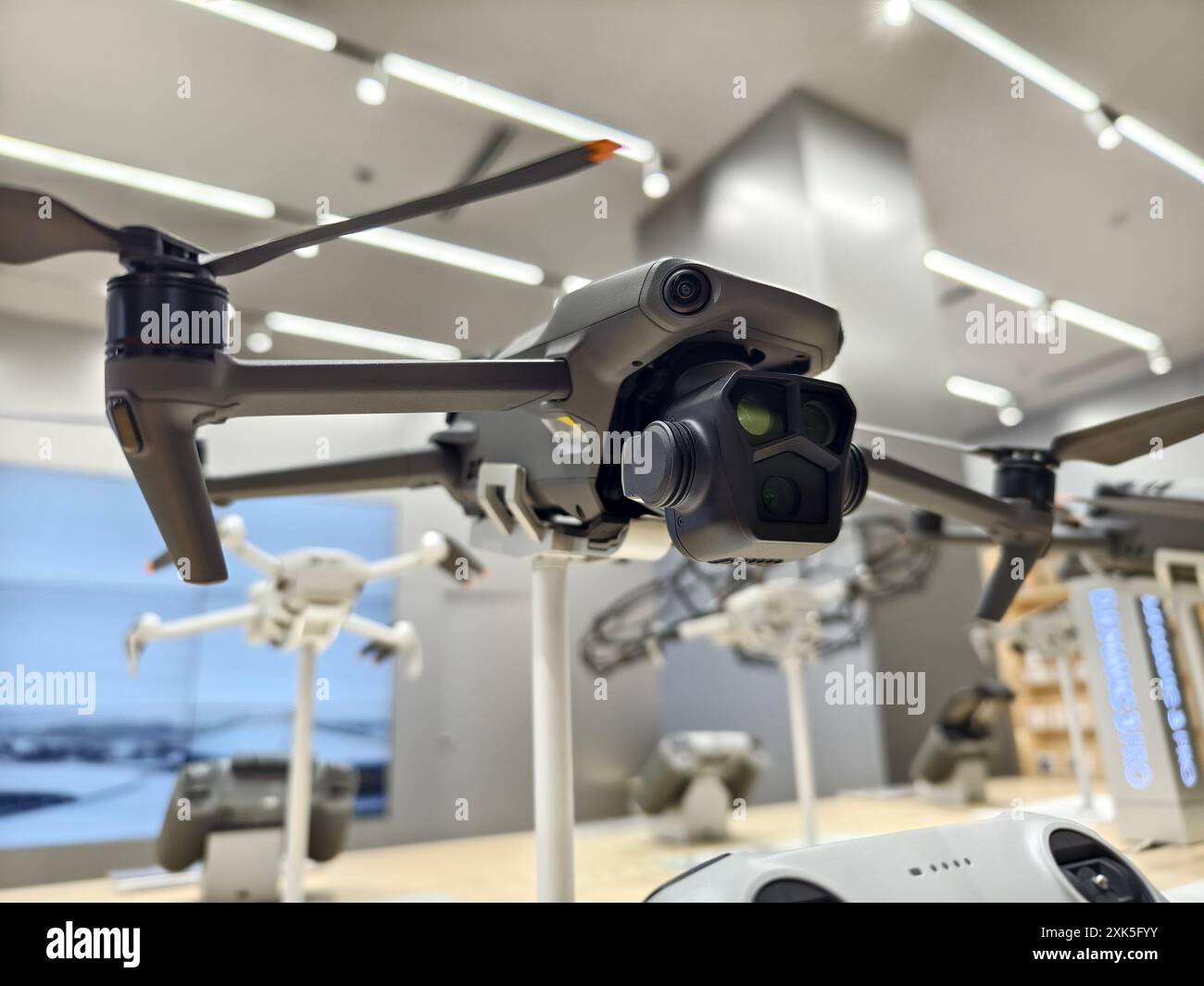 Modern drone for video and photo in the light store Stock Photo - Alamy