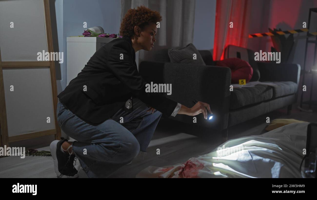 African american woman detective investigates crime scene indoors with ...