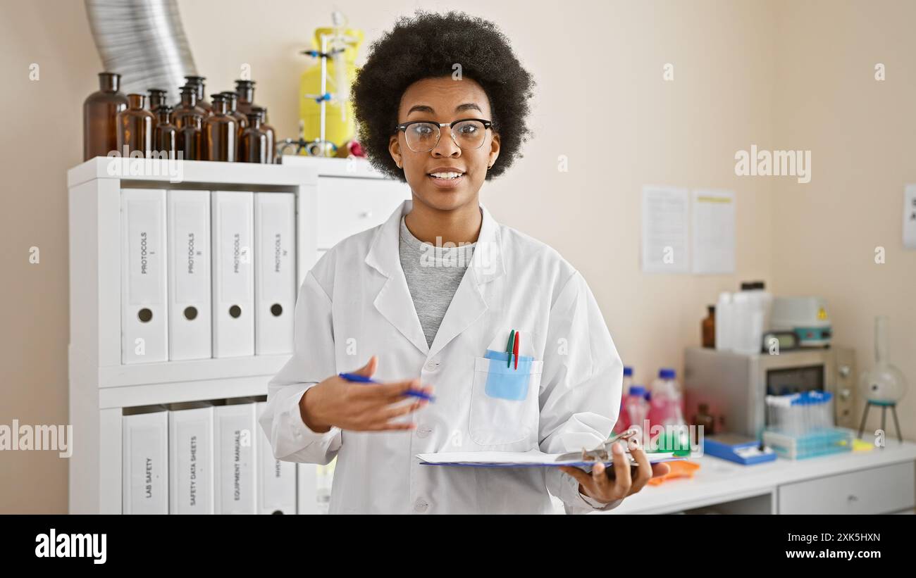African female testing chemicals in lab hi-res stock photography and ...