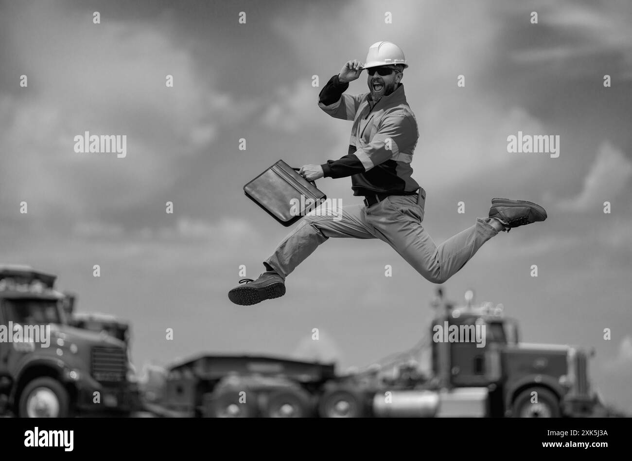 Hispanic builder excited jump and run on site construction. Excited ...