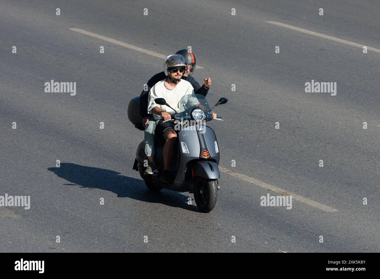 ISTANBUL, TURKEY - JULY 7, 2024: Man from city riding motorcycle on the ...