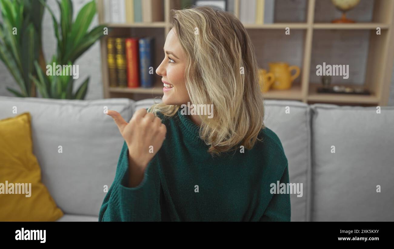 Woman pointing sideways in hi-res stock photography and images - Alamy