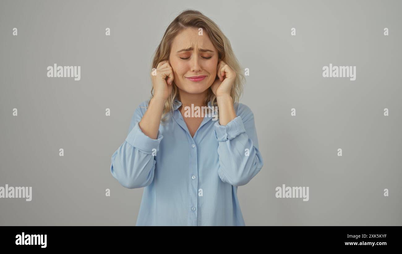 Woman blonde hair covers ears hi-res stock photography and images - Alamy
