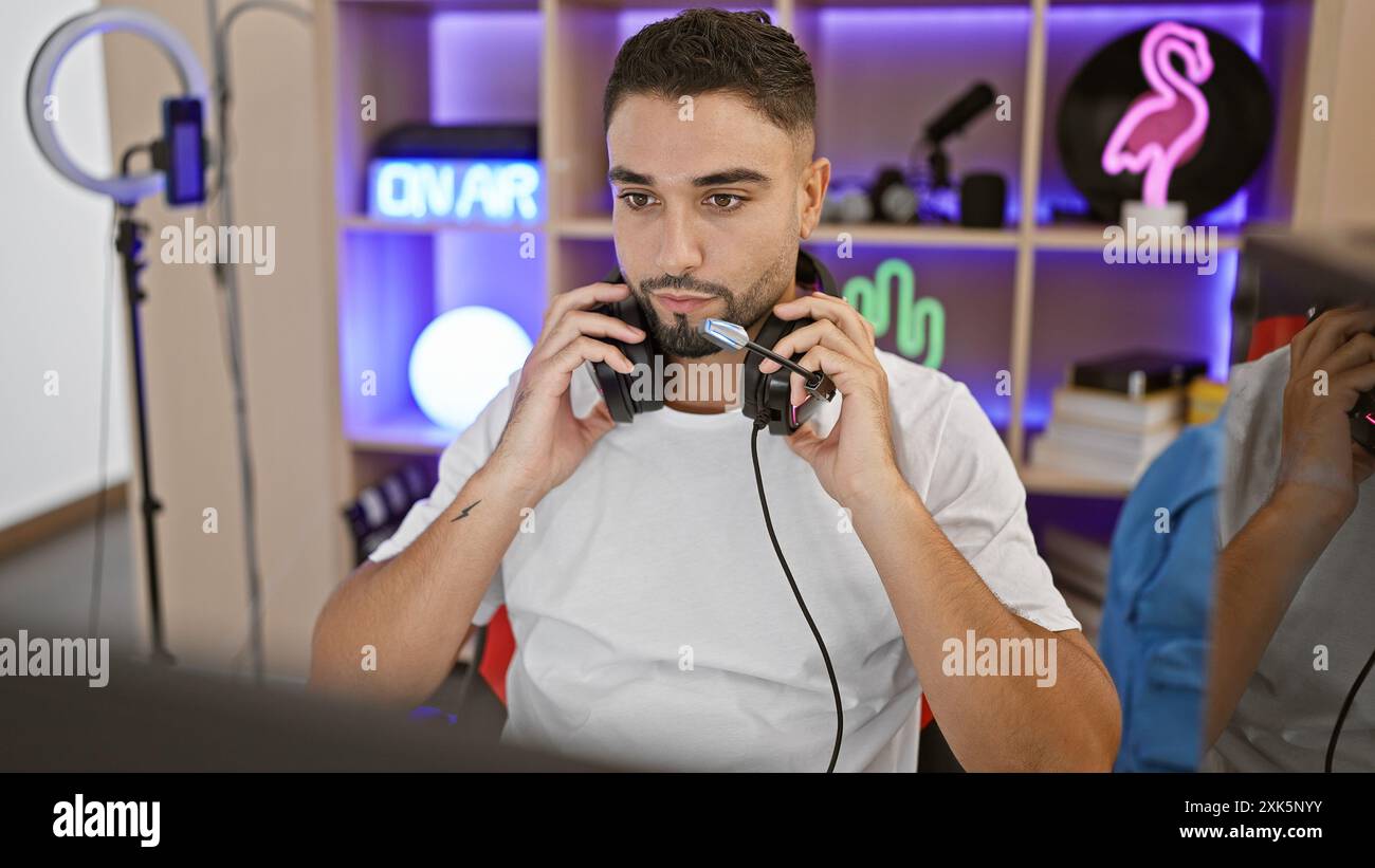 Focused streamer gamer looking camera hi-res stock photography and ...