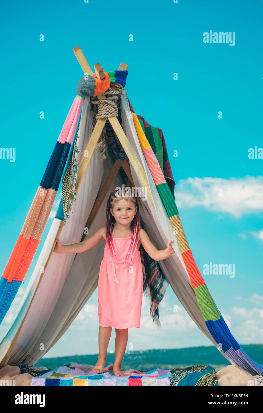 Girl playing in tent. Kids camping. Having fun outdoors. Campground ...