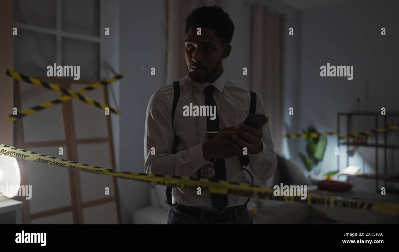 Focused african american detective man analyzing crime scene at dimly ...