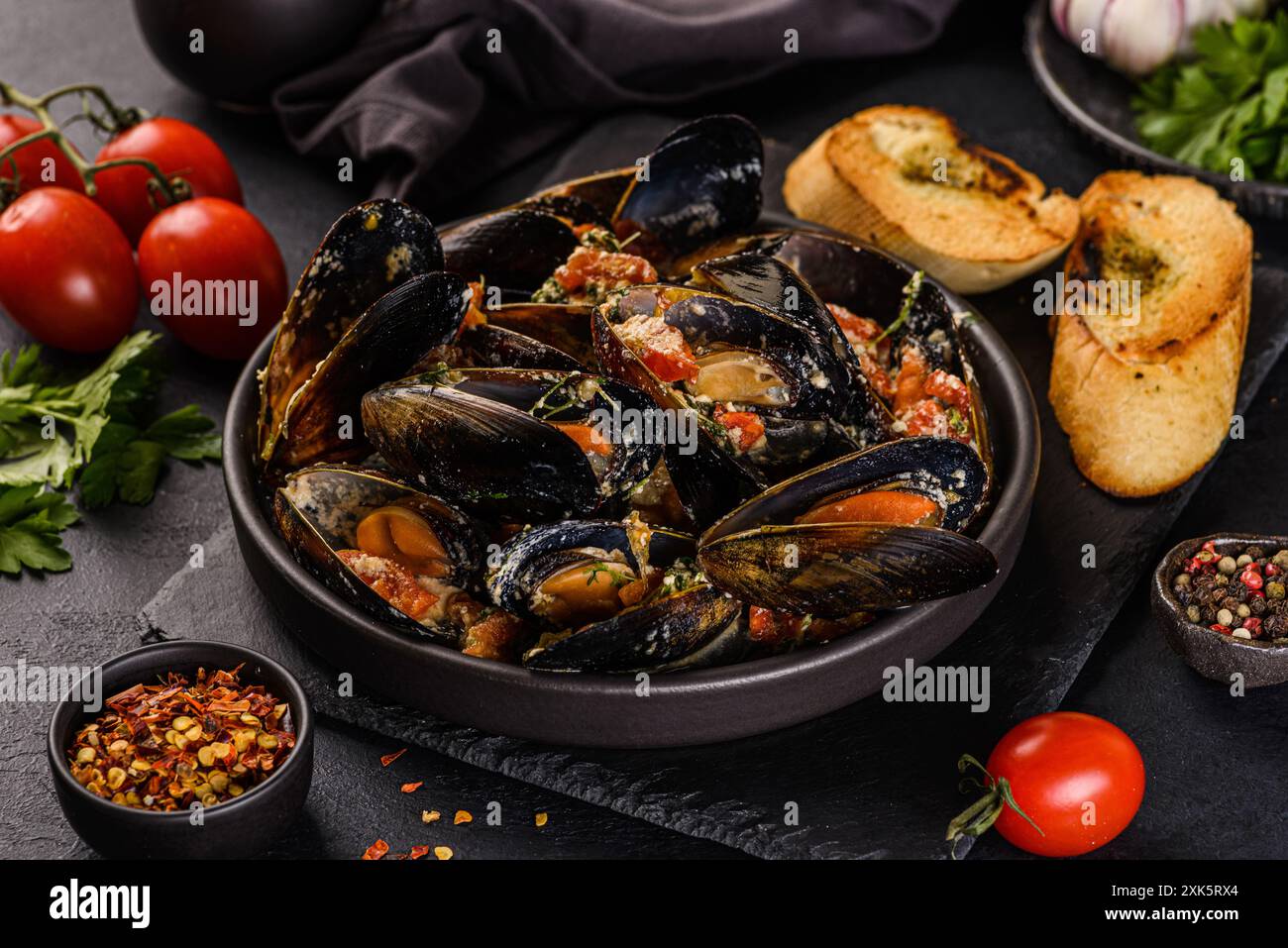 mussels cooked on a blackboard Stock Photo - Alamy