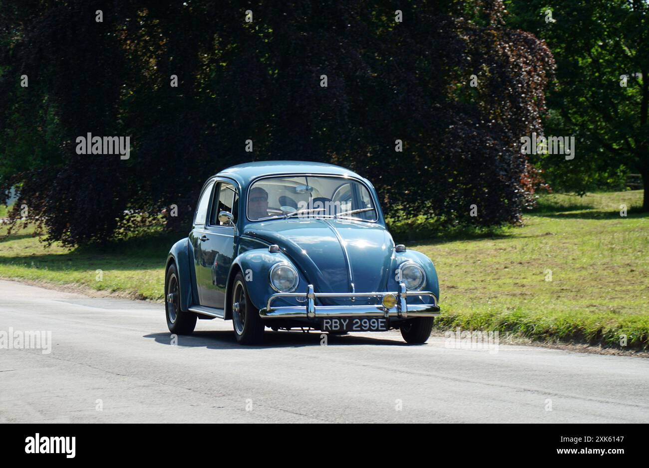Classic Blue Volkswagen Beetle on country road Stock Photo - Alamy