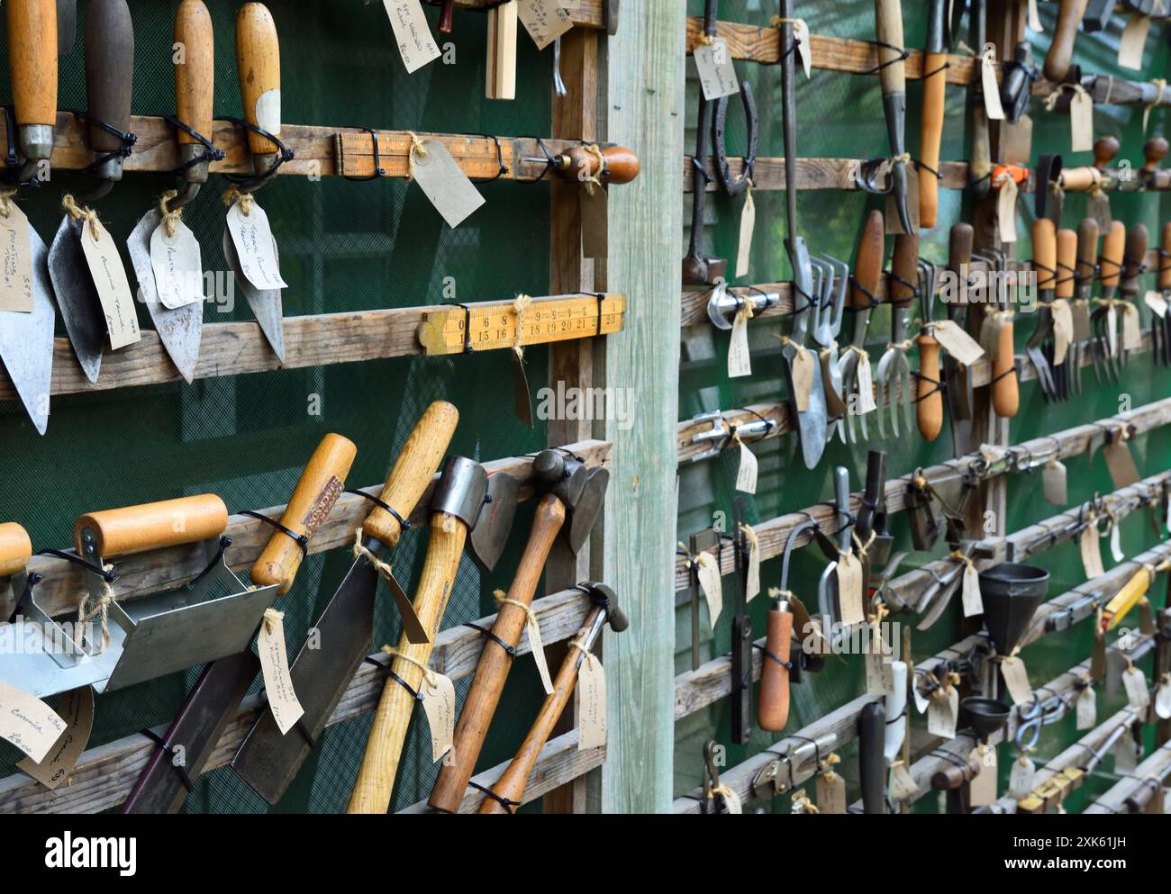 Traditional hand tools displayed on wall Stock Photo - Alamy