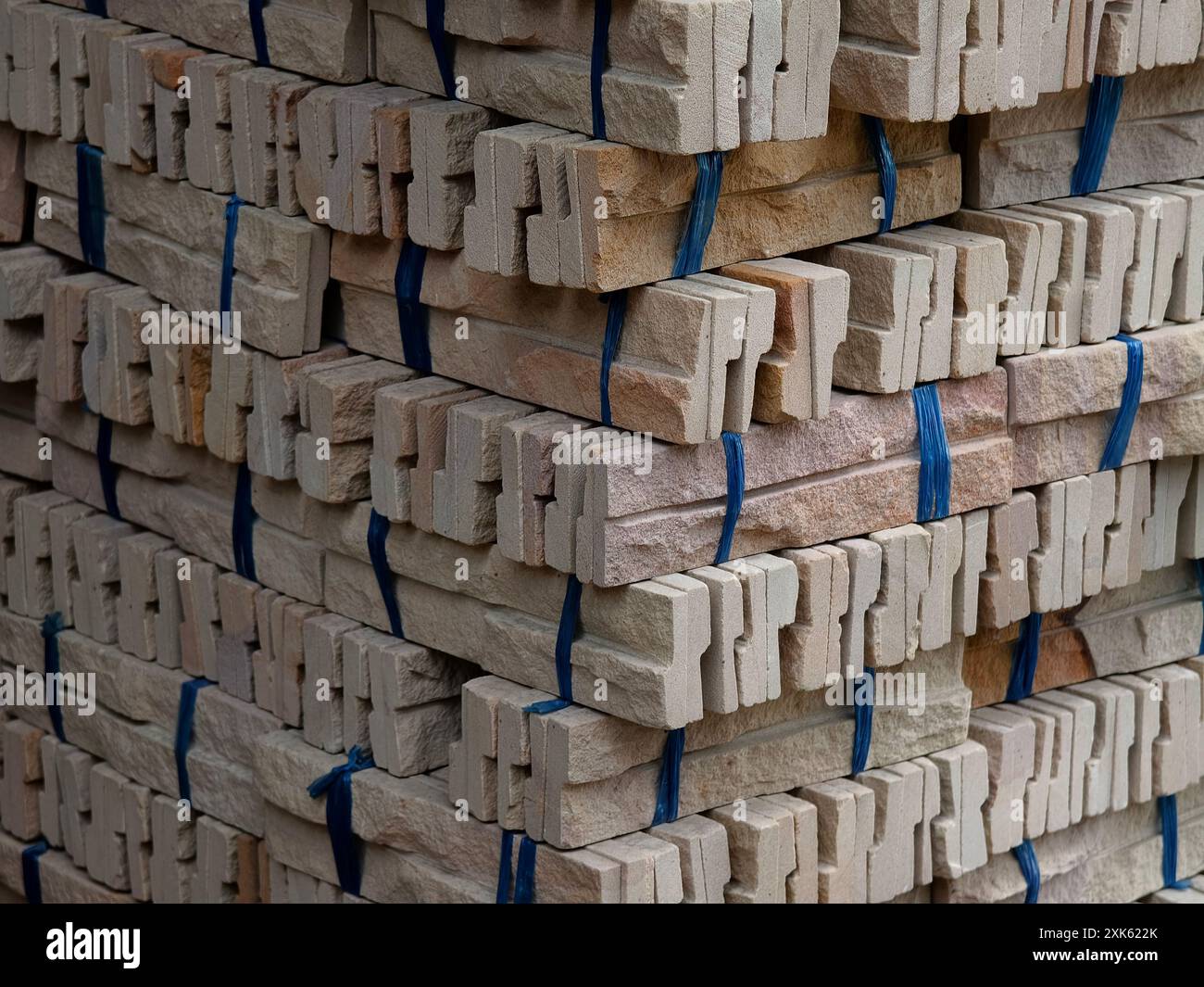 Brick stack tied with ropes for construction and building purposes ...