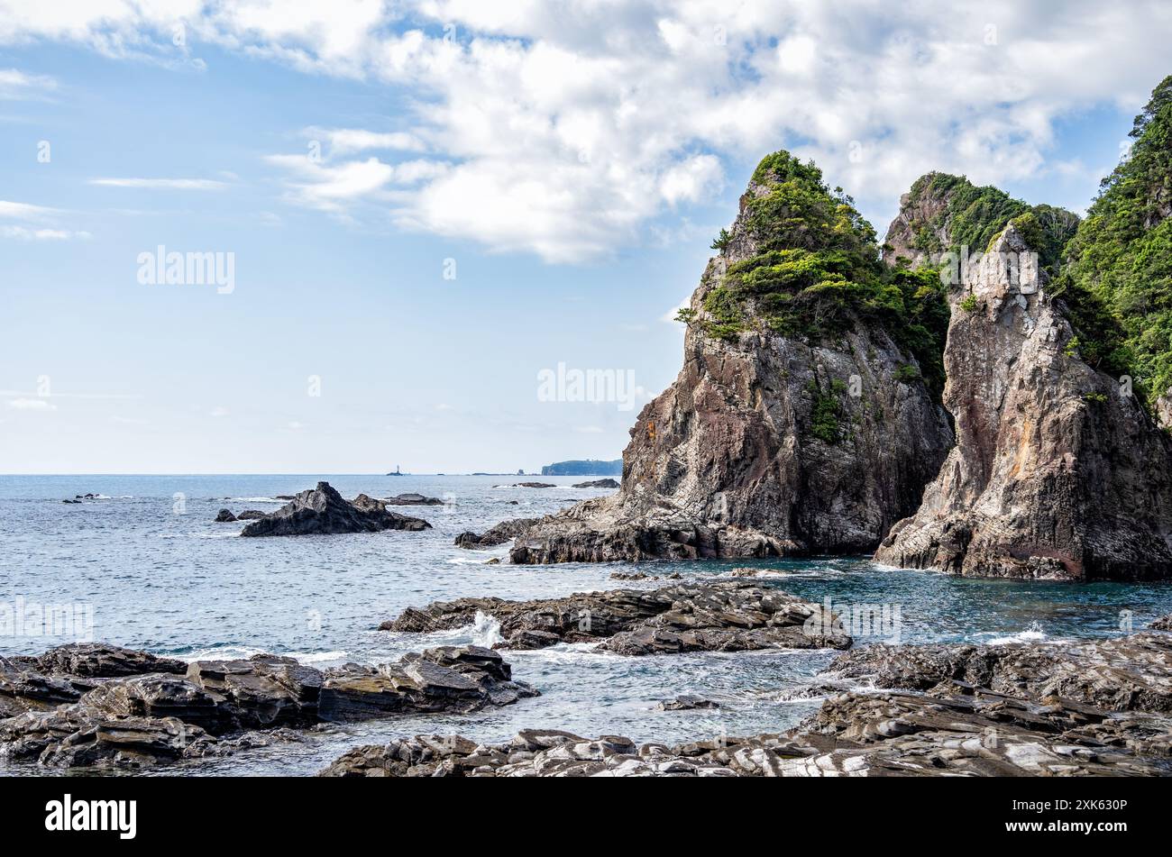 Dramatic rock formations on the coast of Pacific Ocean in Nachikatsuura ...