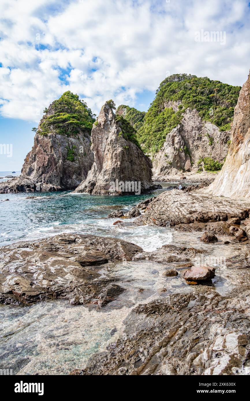 Dramatic rock formations on the coast of Pacific Ocean in Nachikatsuura ...