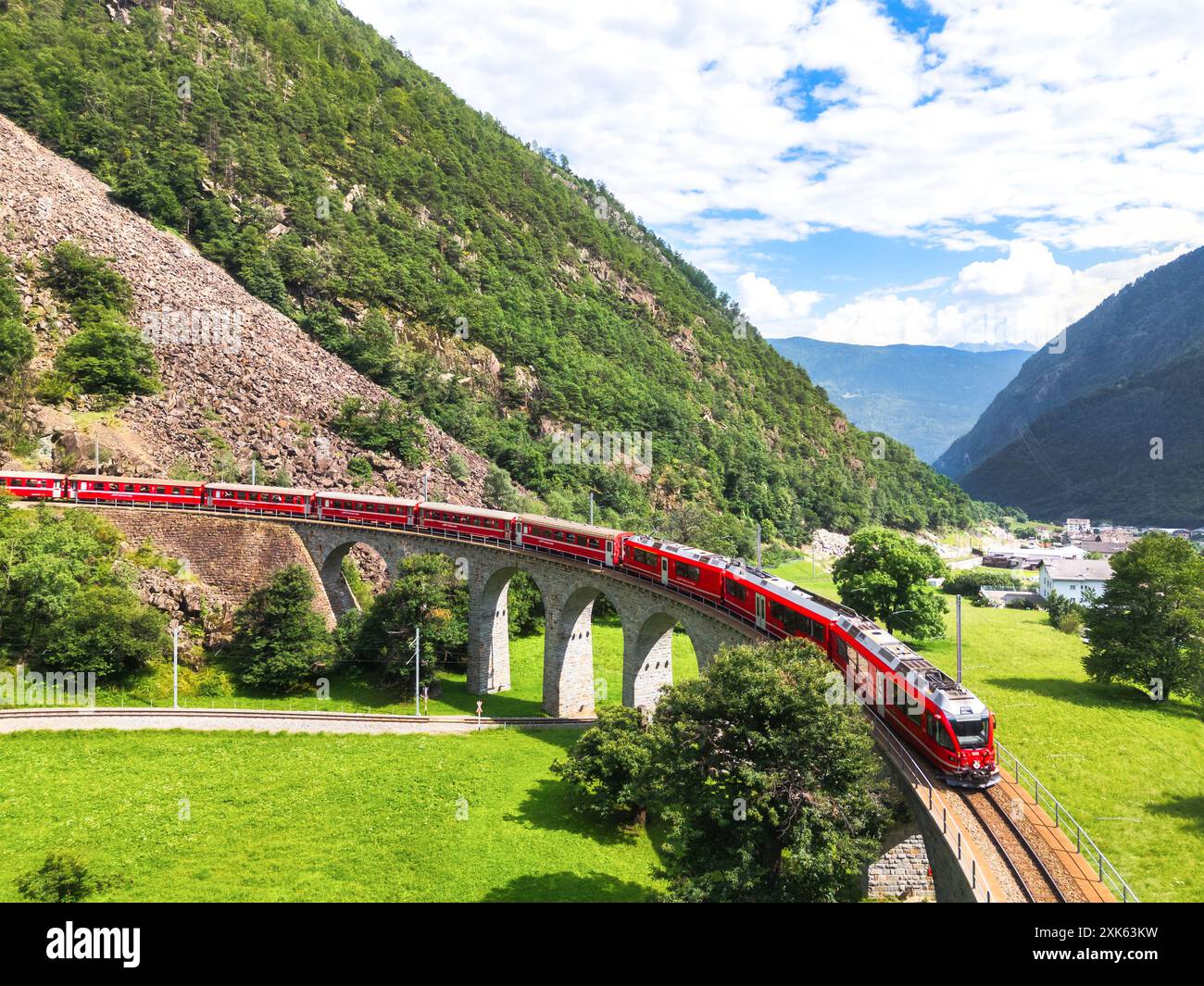 Aerial view of a Bernina Express train crossing the Brusio spiral ...
