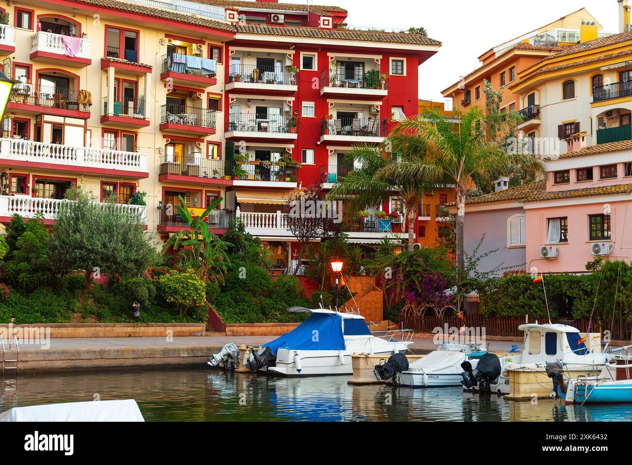 Colorful Waterfront Homes in Port Saplaya, Valencia Stock Photo - Alamy
