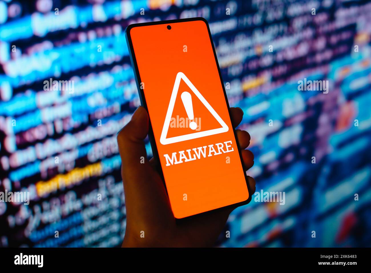In this photo illustration, the Malware icon is displayed on a ...