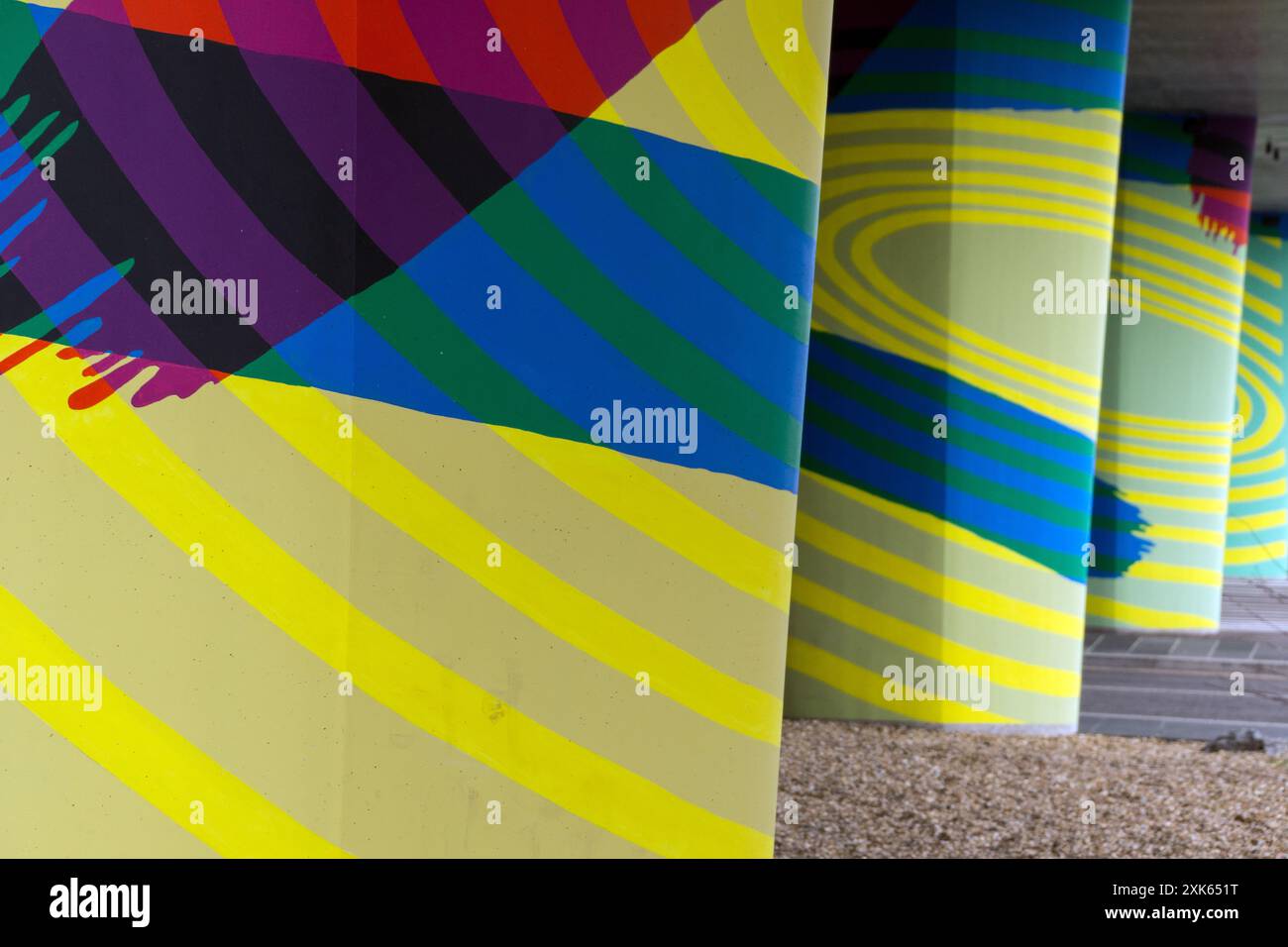 Dundee, Scotland – March 24 2024:The pillars in an underpass, painted ...