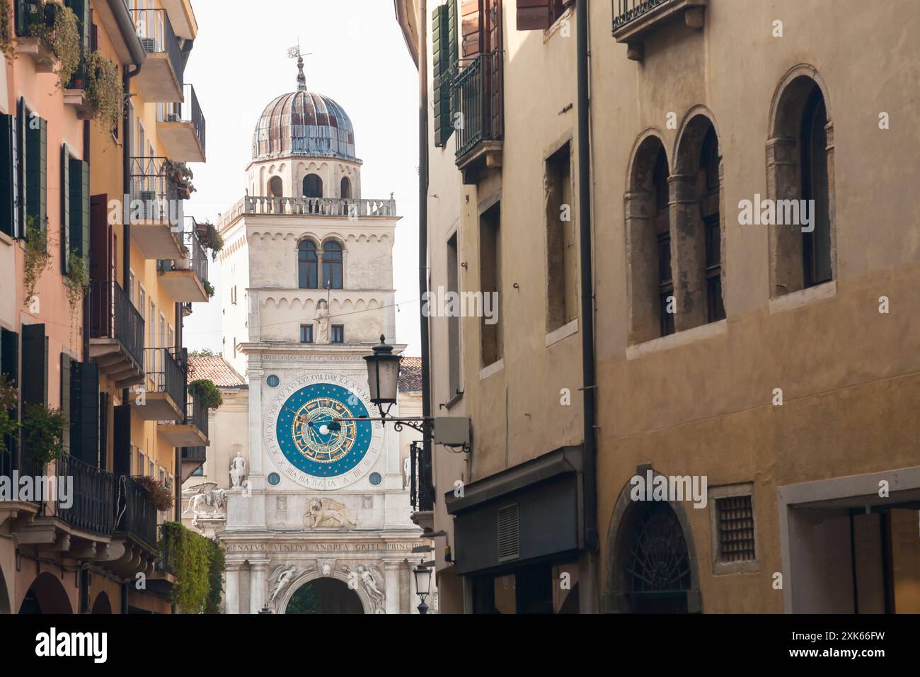 The clock tower with astronomical clock in the historic center of Padua ...