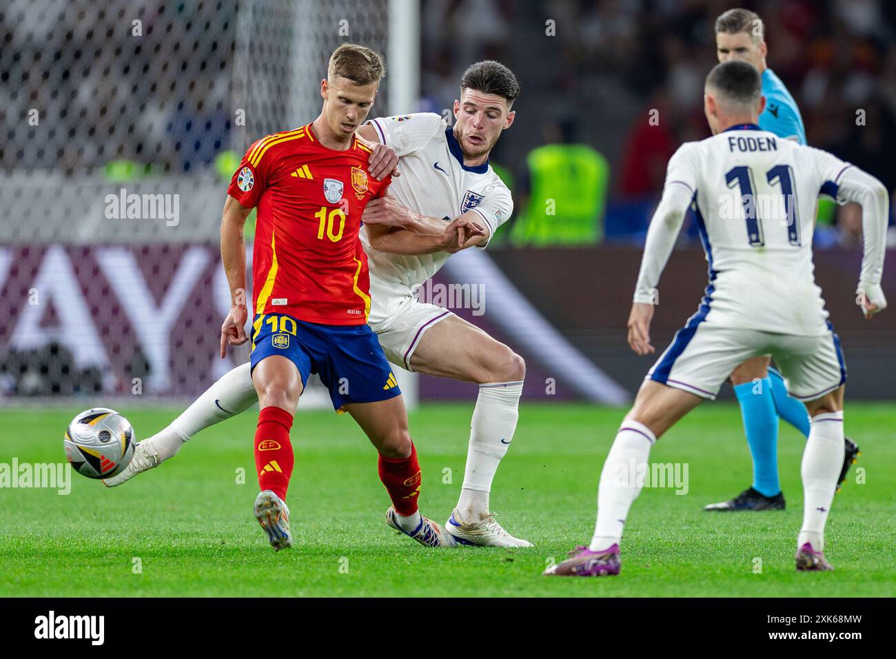 Dani Olmo (L) of Spain and Declan Rice (R) of England are seen in ...