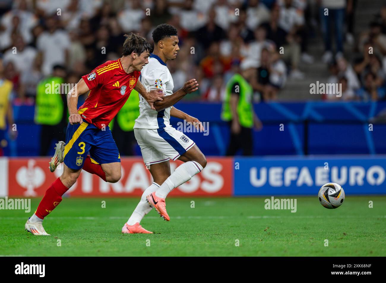 Robin Le Normand (L) of Spain and Ollie Watkins (R) of England are seen ...