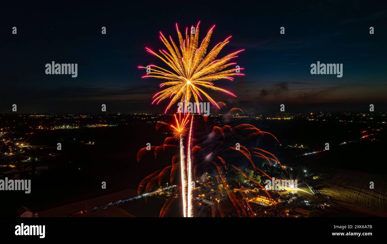 Golden And Red Fireworks Explode Brilliantly In The Night Sky, Creating ...