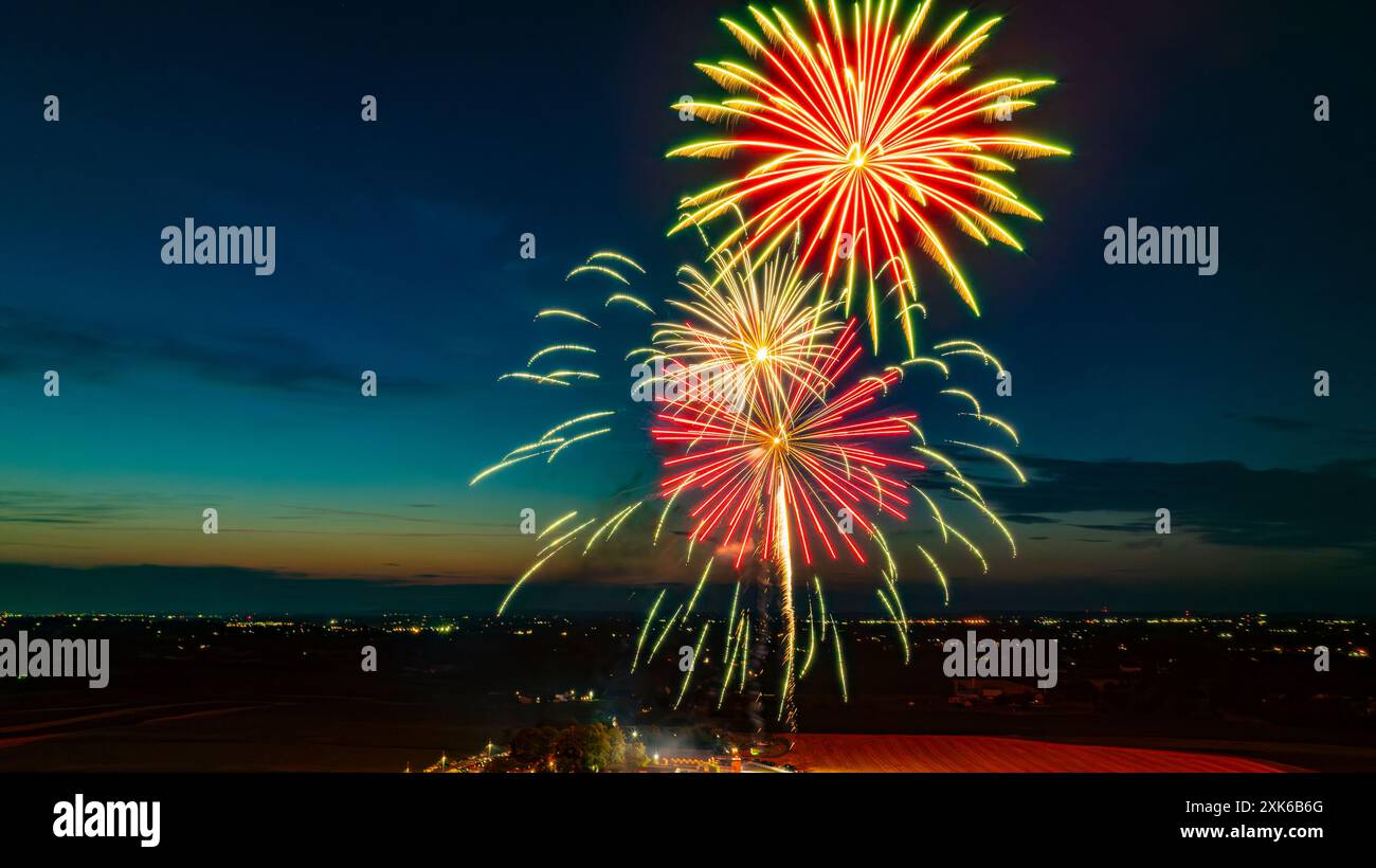 Bright Red And Green Fireworks Exploding In The Night Sky, Casting ...