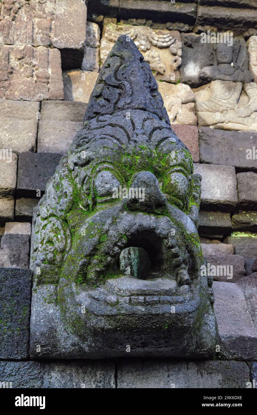 The head of a stone idol on the guard of the Borobudur temple ...