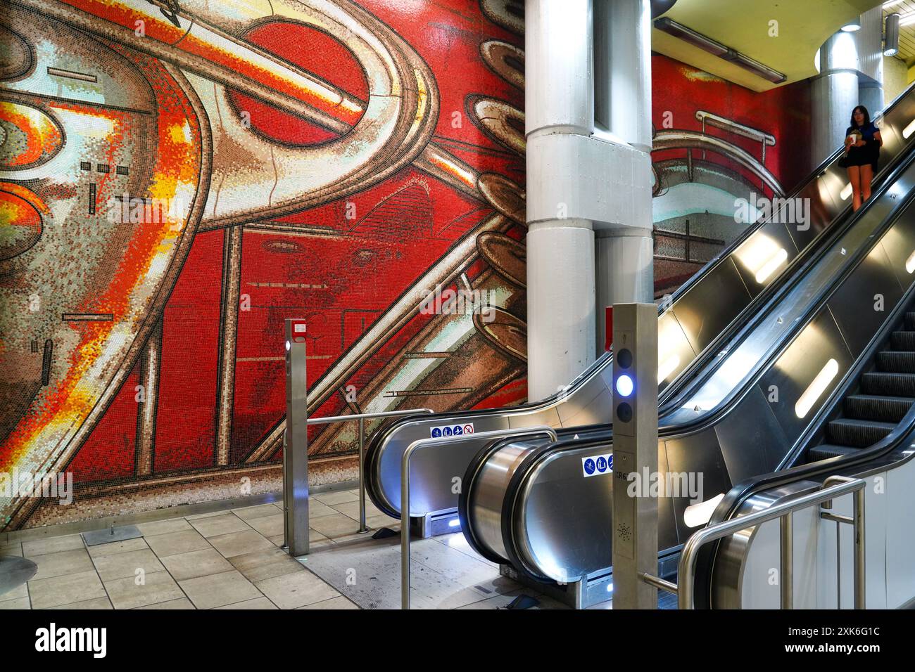 Escalators in the Kröpcke subway station in Hanover/Germany. The walls ...