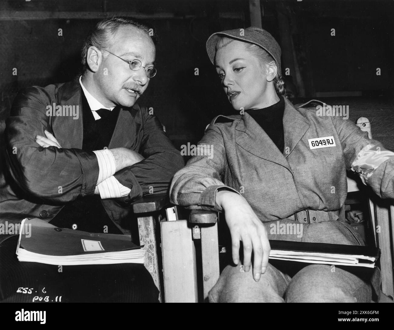 DAVID KOSSOFF and JAN STERLING chatting between scenes on the set of ...