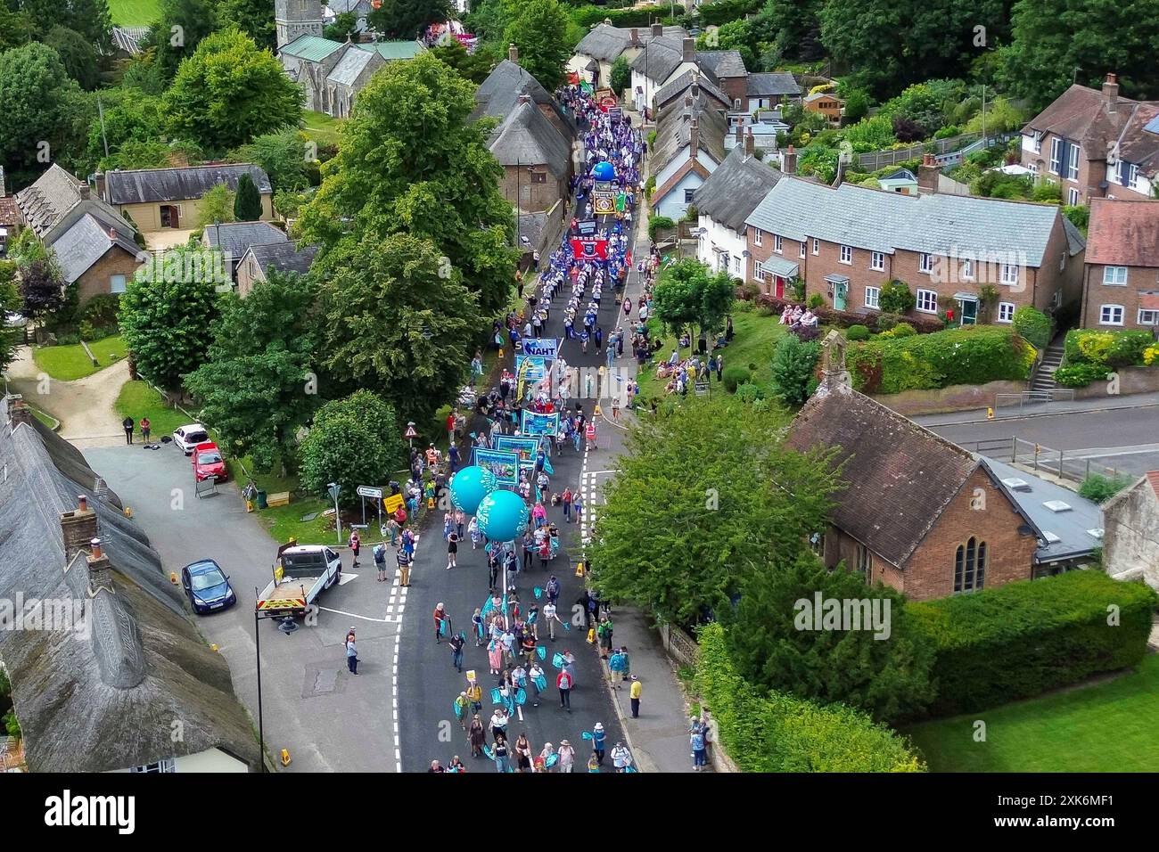 Tolpuddle, Dorset, UK. 21st July 2024. Aerial view of the parade at the ...